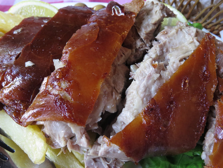 Roast suckling pig with honey and lemon – Campo Grande
